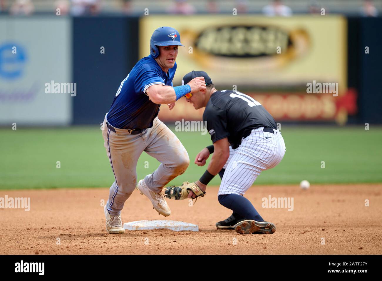 Toronto Blue Jays Daulton Varsho (25) runs to third base after ...