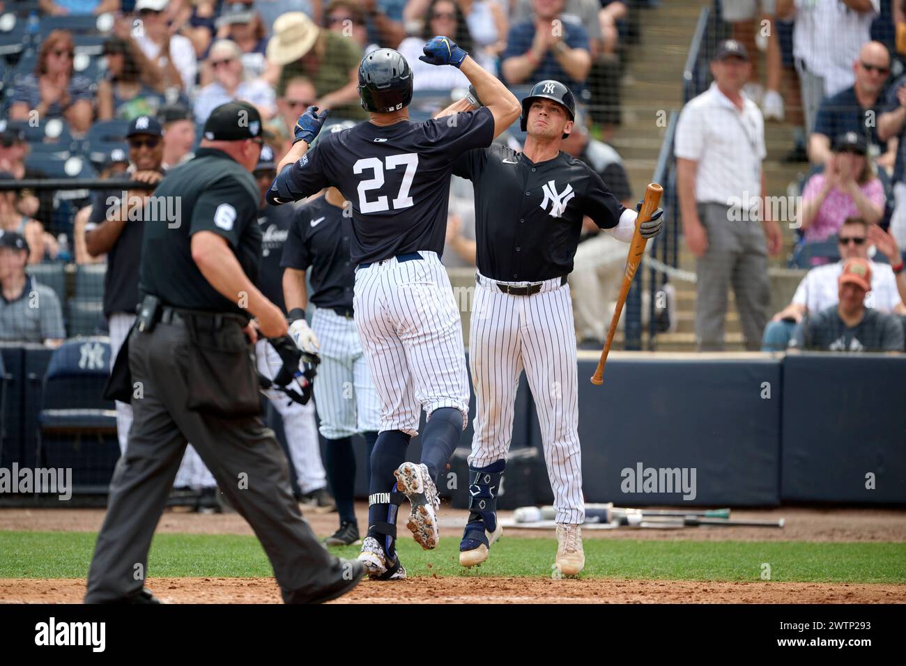New York Yankees Giancarlo Stanton (27) celebrates hitting a home run ...
