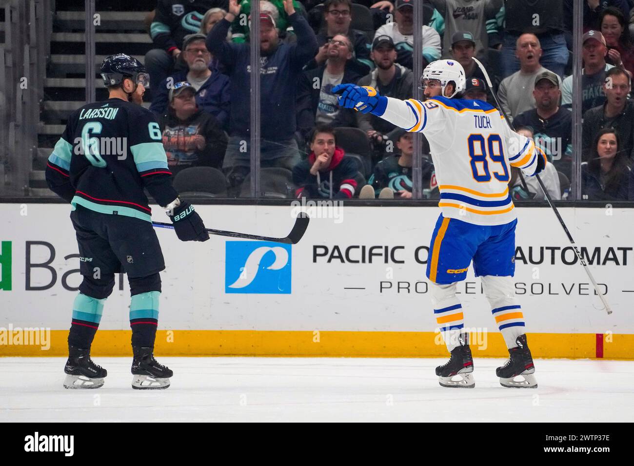 Buffalo Sabres right wing Alex Tuch (89) points after scoring as ...