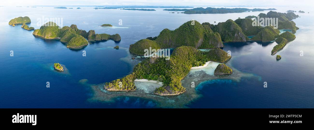 Beautiful limestone islands rise from Raja Ampat's tropical seascape ...