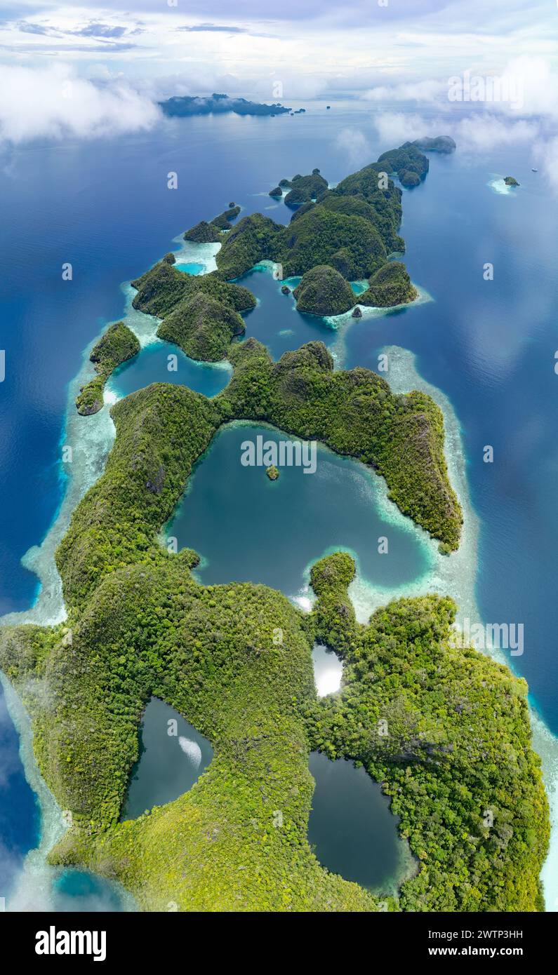 Beautiful limestone islands rise from Raja Ampat's tropical seascape ...