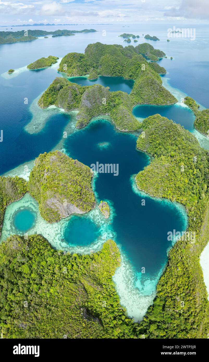 Beautiful limestone islands rise from Raja Ampat's tropical seascape ...