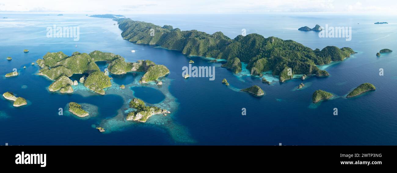 Beautiful limestone islands rise from Raja Ampat's tropical seascape ...