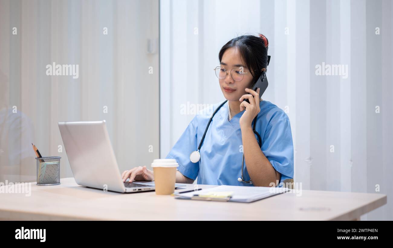 Hardworking young female doctor talking hi-res stock photography and ...