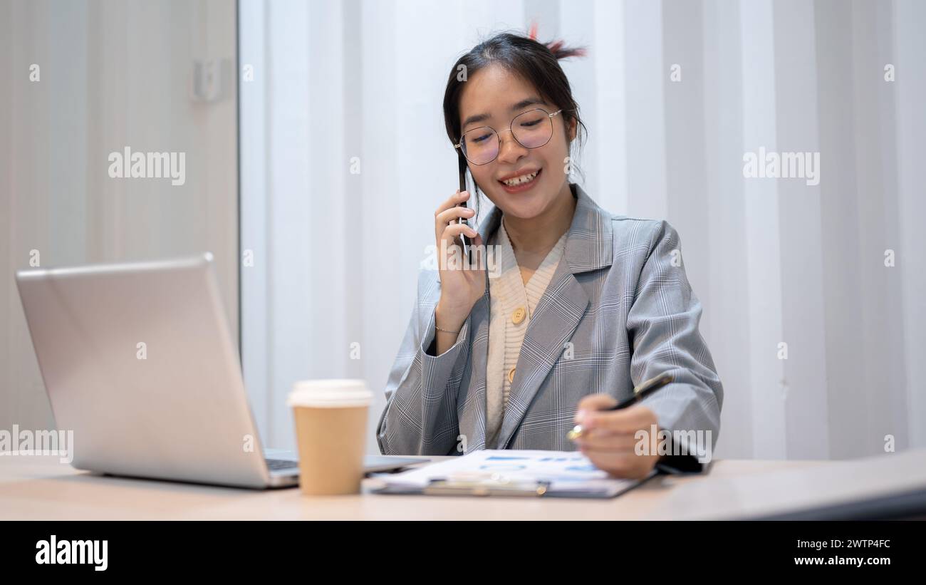 Multitasking secretary hi-res stock photography and images - Alamy