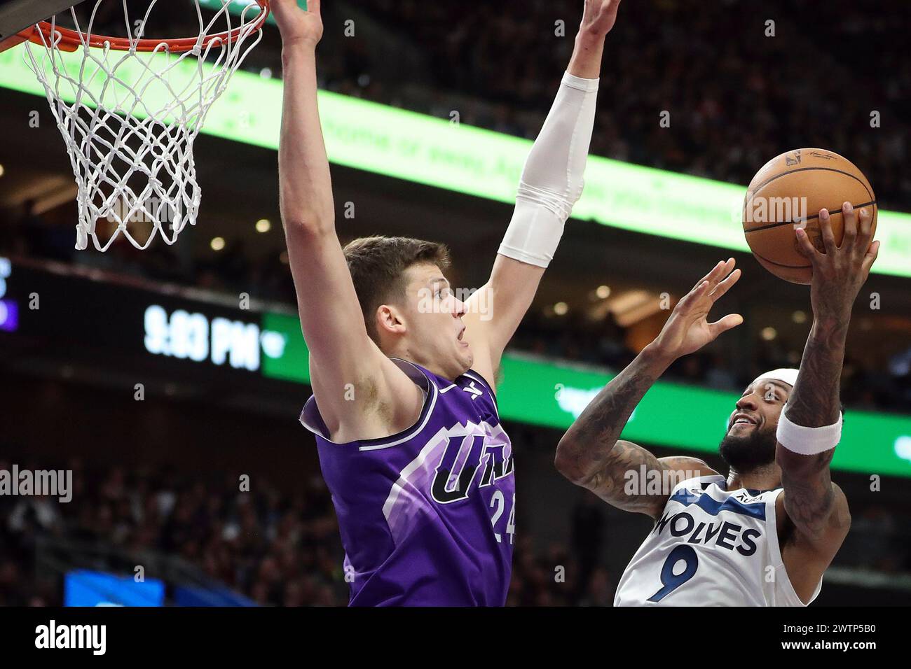 Minnesota Timberwolves guard Nickeil Alexander-Walker (9) shoots ...