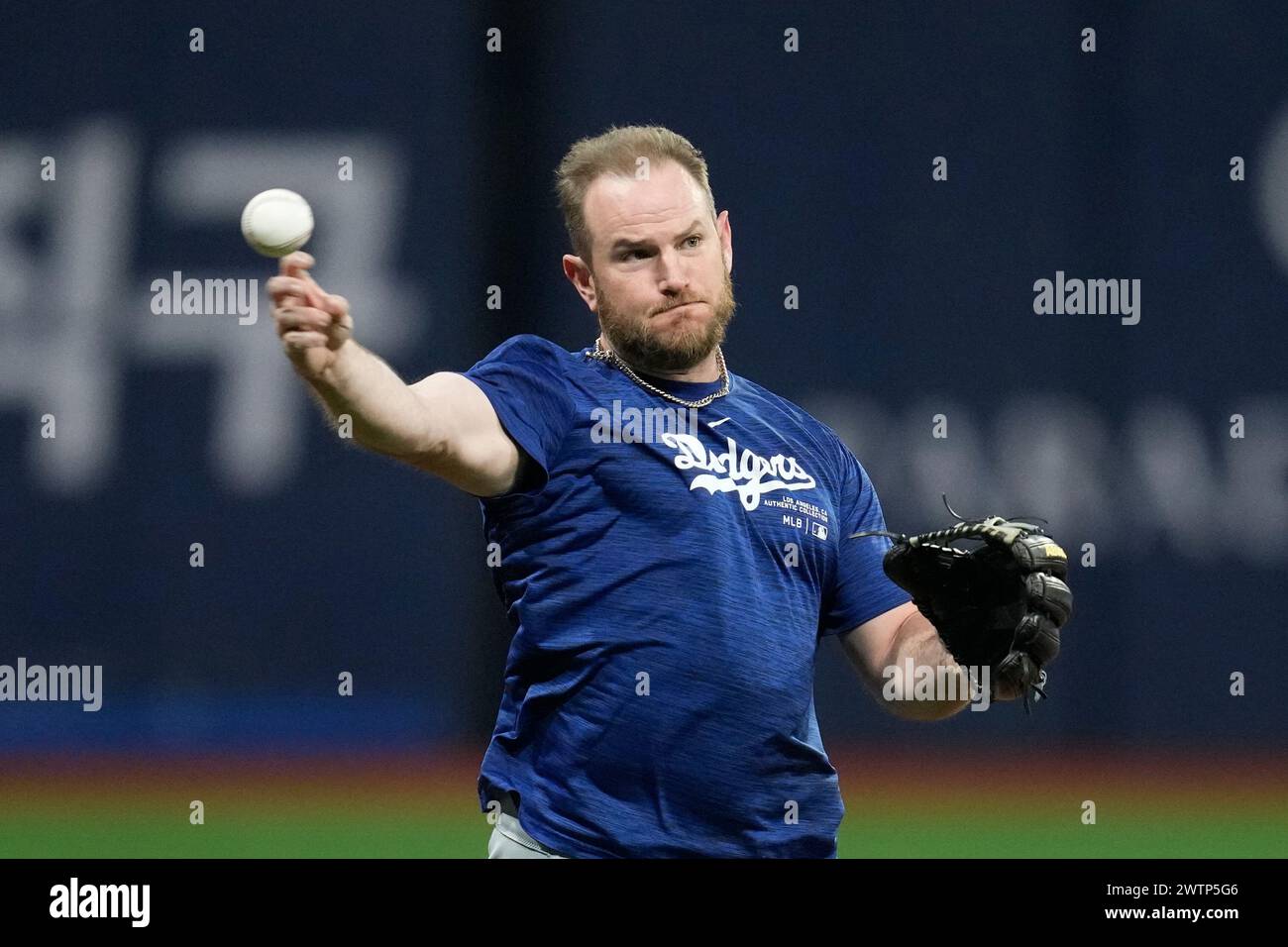 Los Angeles Dodgers' Max Muncy fields a ground ball during a baseball ...