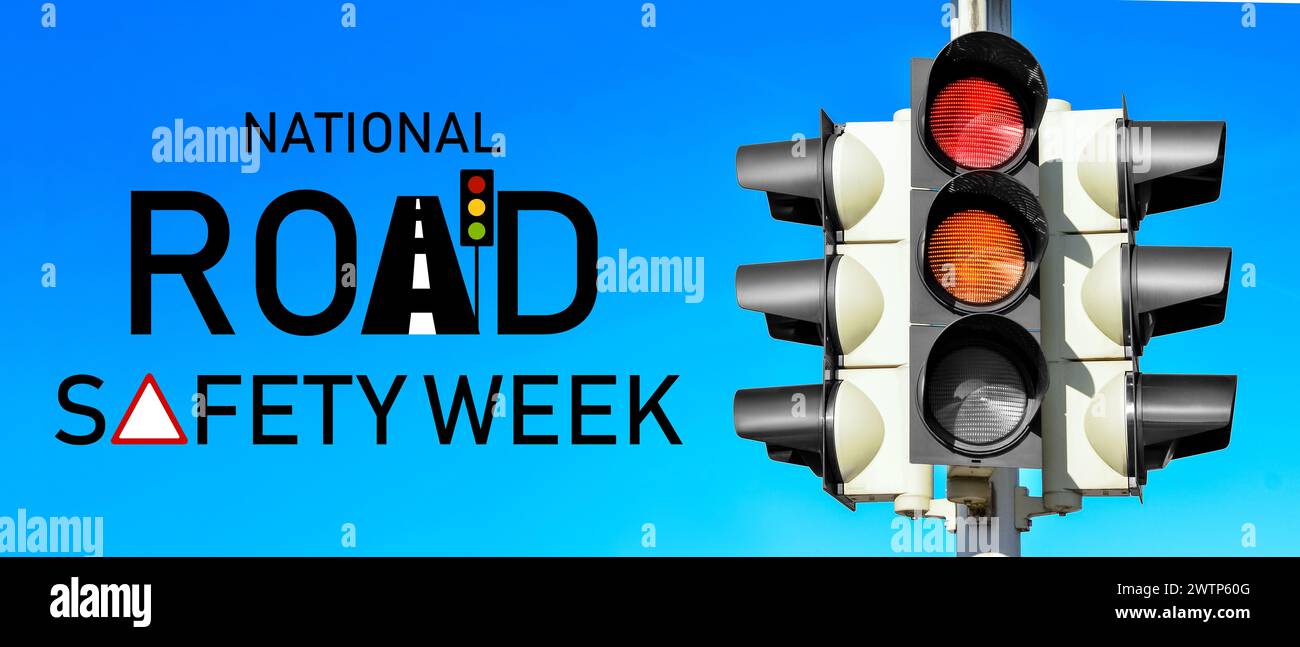 Street traffic control lights against blue sky. Banner for National ...