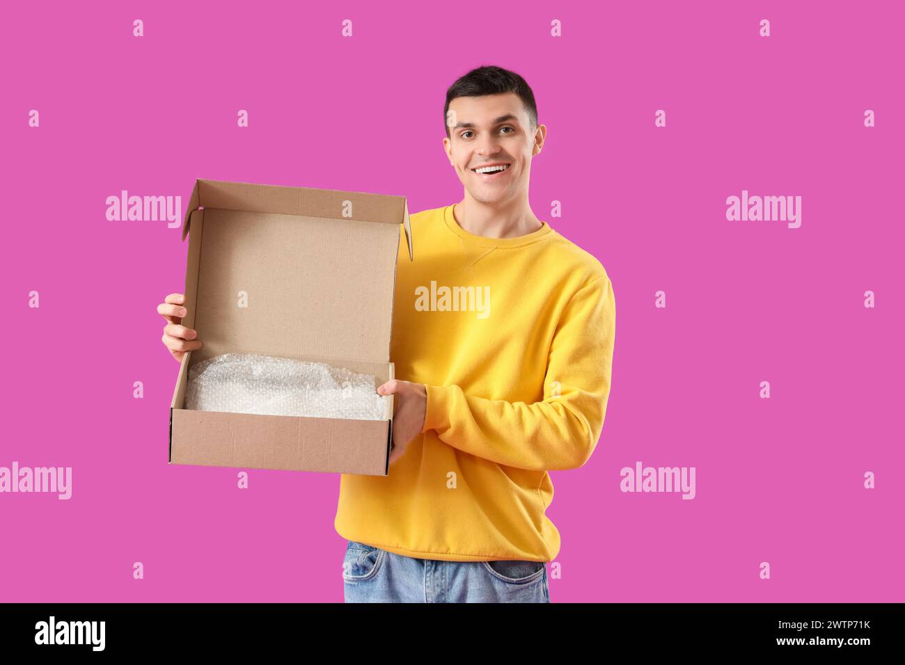 Happy male customer open parcel hi-res stock photography and images - Alamy