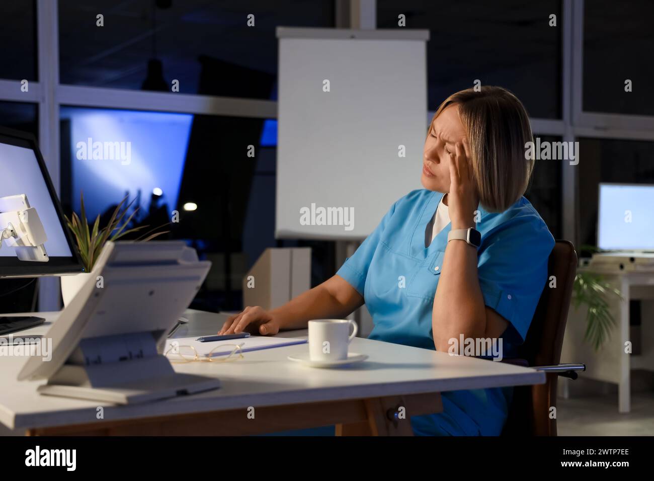 Tired middle aged female doctor hi-res stock photography and images - Alamy