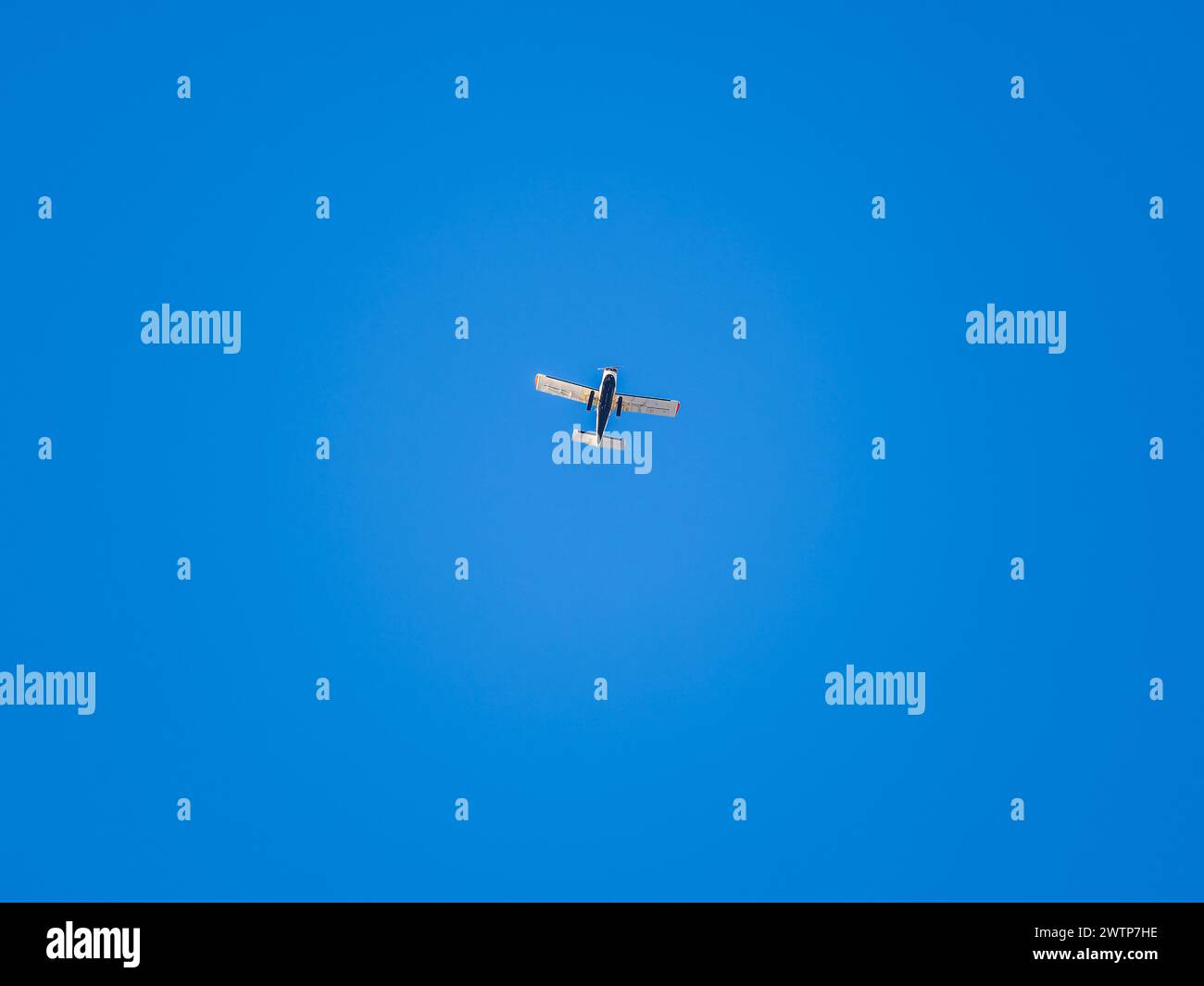 Small ultralight airplane with overhead wing and single propeller ...