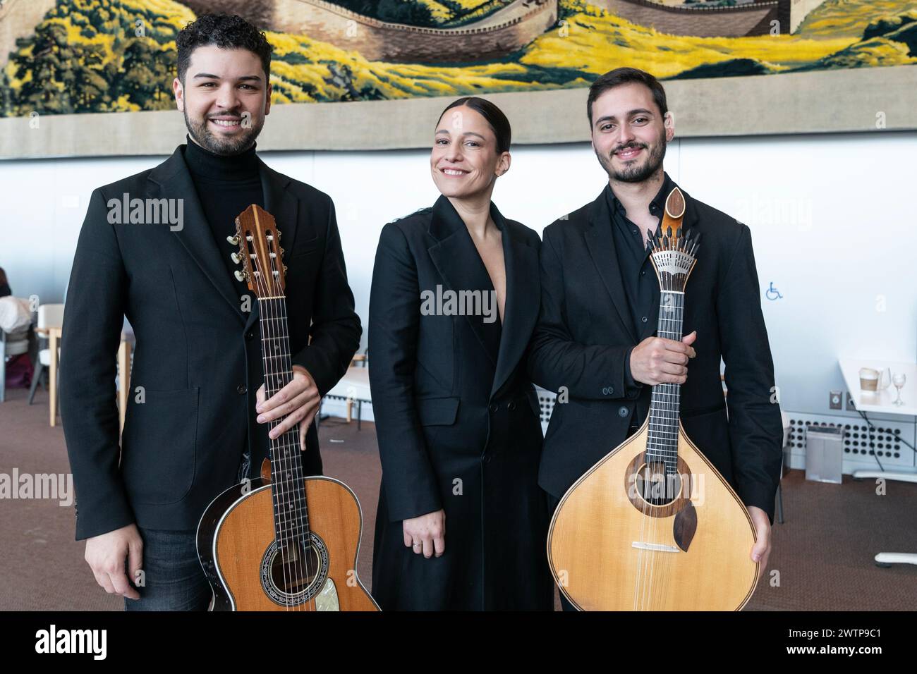 Singer Carminho and musicians pose during ceremony of Portuguese gift ...