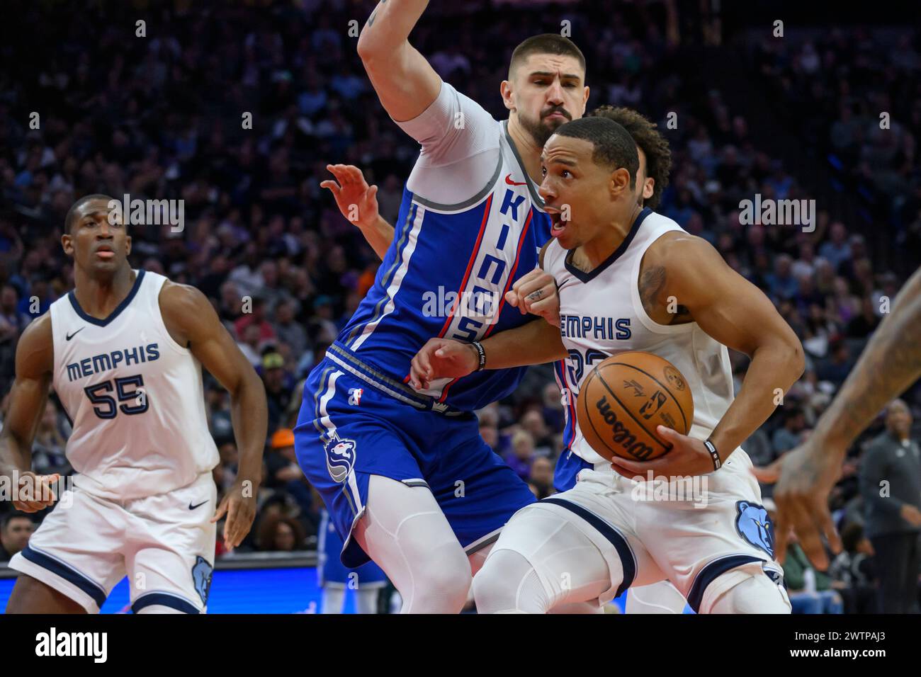 Sacramento Kings center Alex Len guards Memphis Grizzlies guard Desmond ...