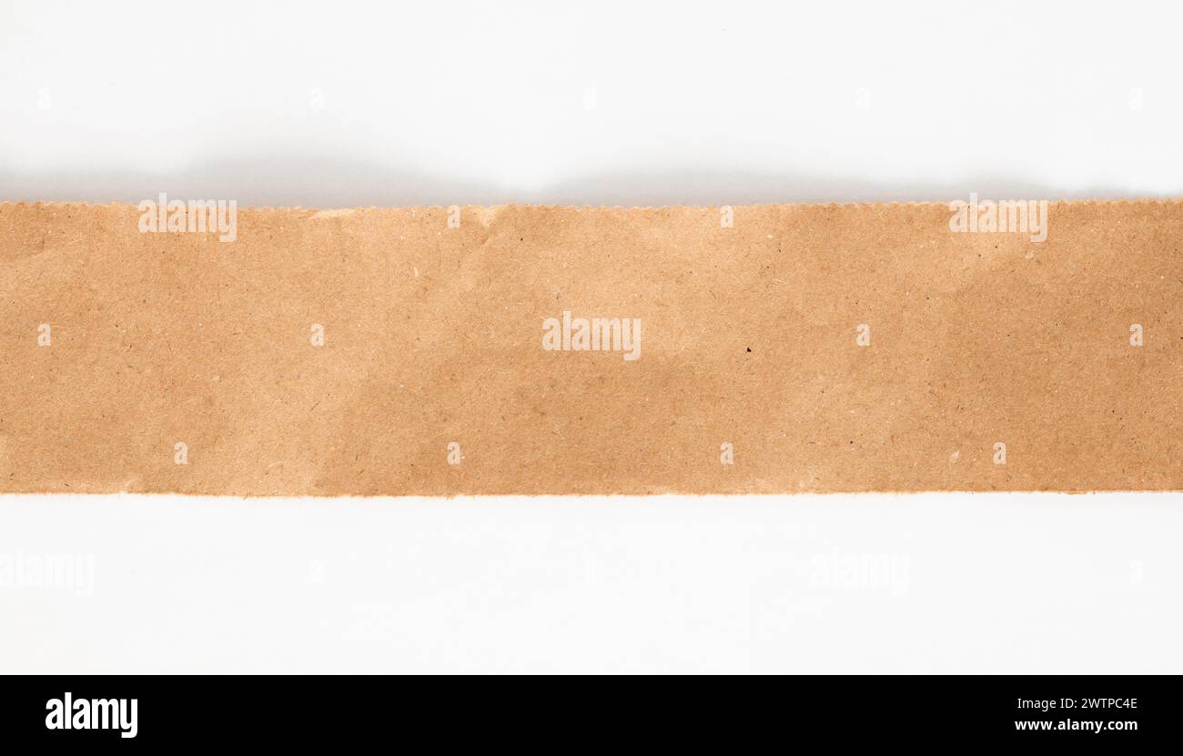Close-Up View of a Horizontal Brown Paper Strip Against a White ...