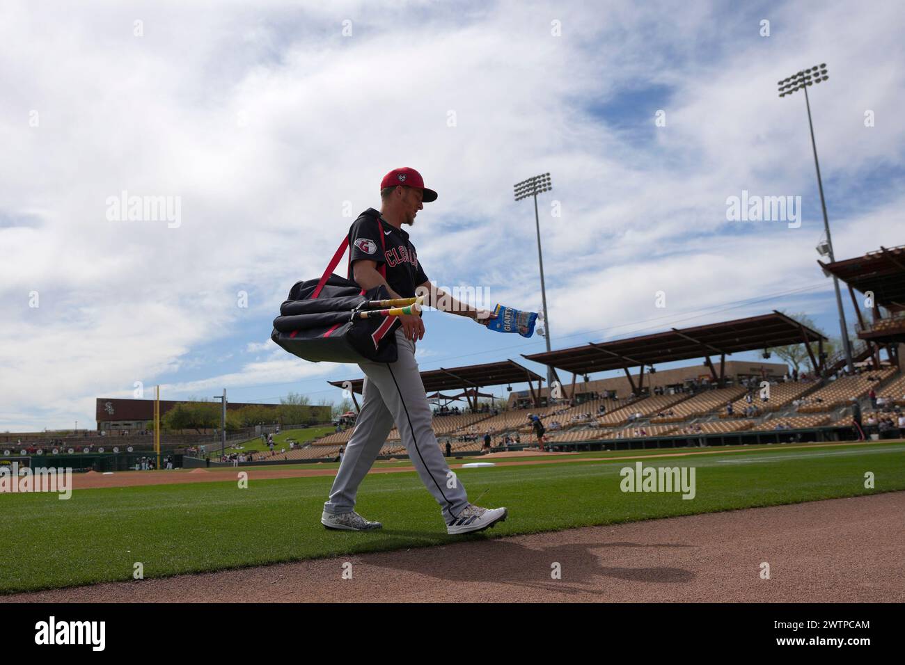 Cleveland Guardians' Myles Straw walks to the dugout prior to a spring ...