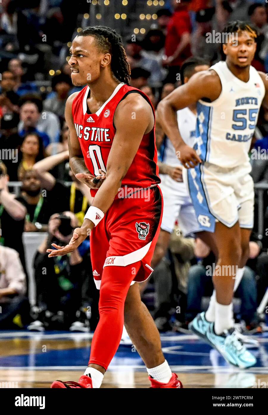WASHINGTON, DC - MARCH 16: North Carolina State Wolfpack guard DJ Horne (0) reacts after making ...