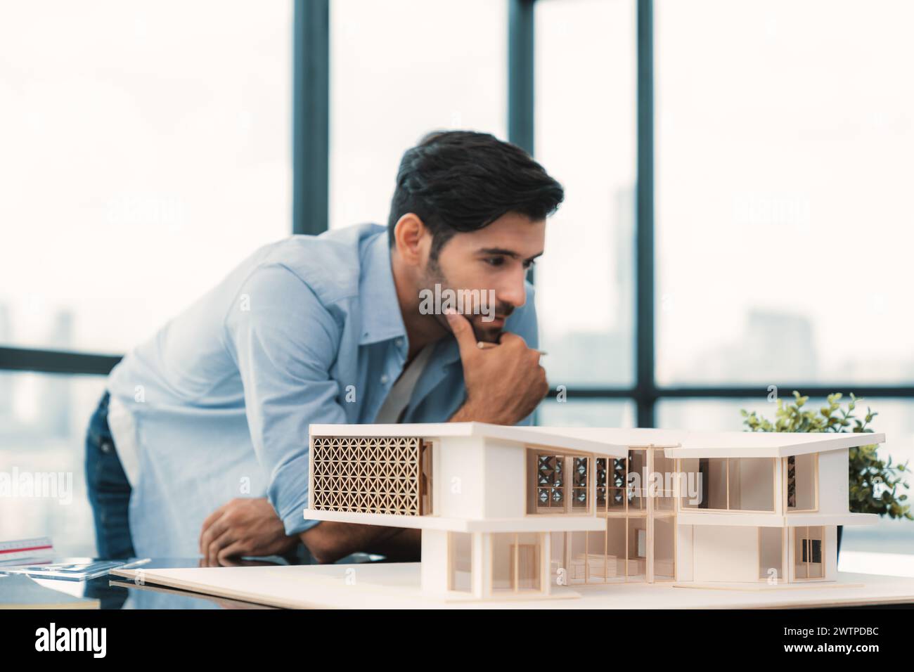 Smart civil architect engineer looking while planing design house ...