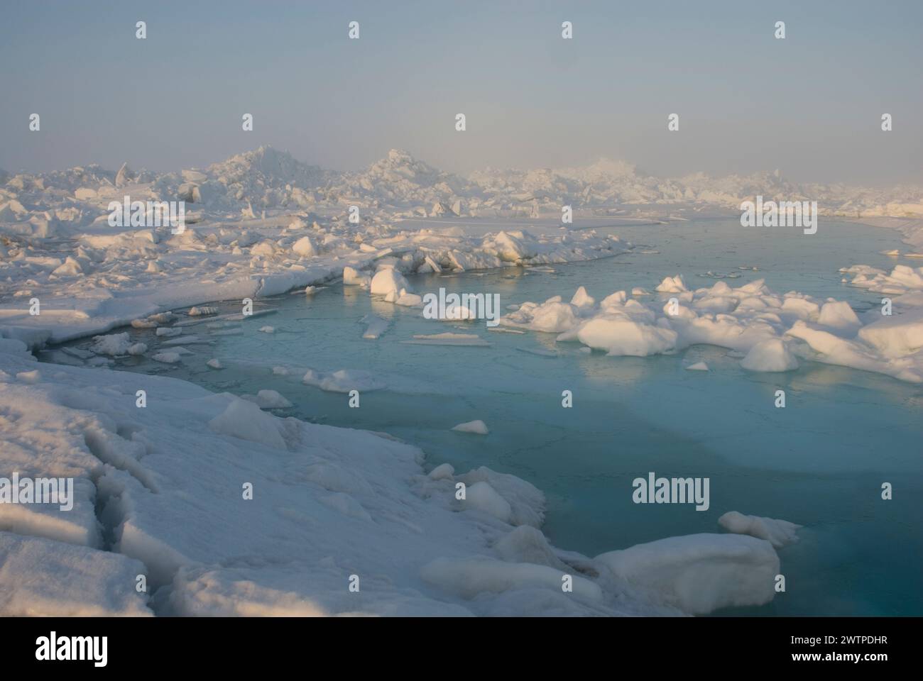 Seascape of rough pack ice over the Chukchi sea in springtime, off ...