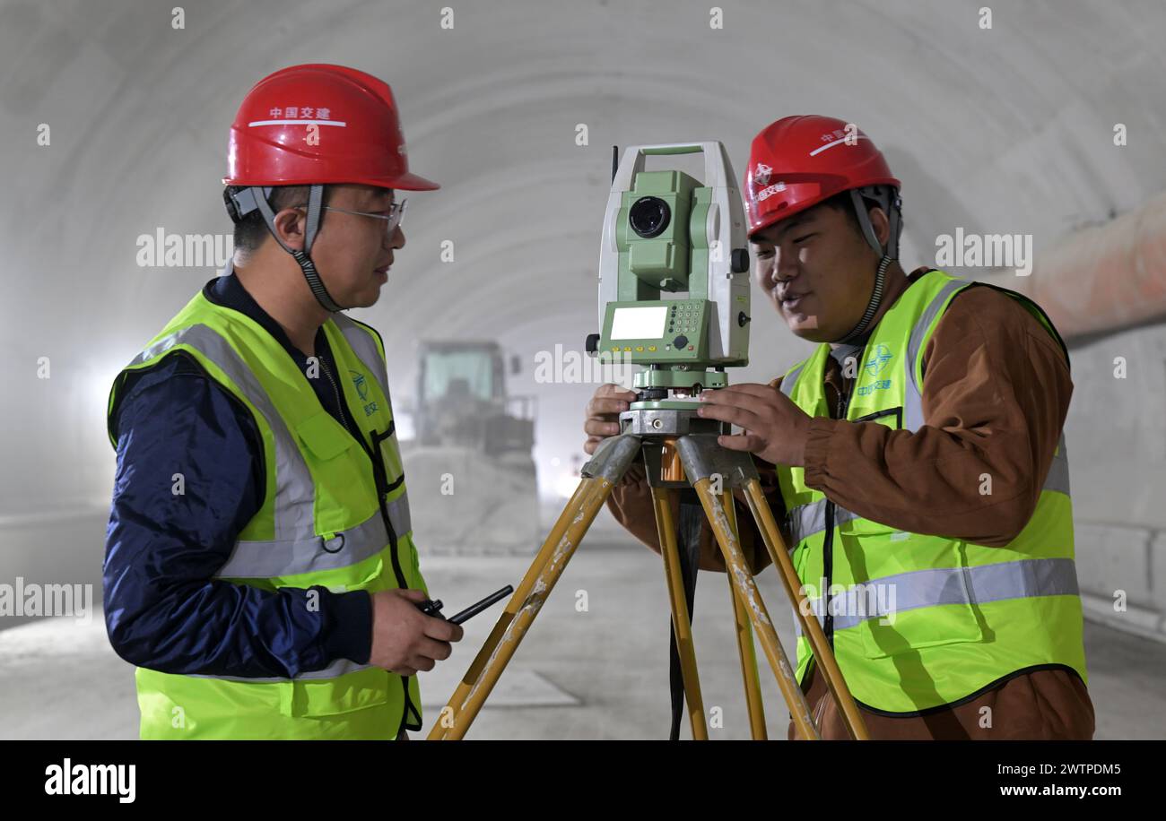 BAZHOU, CHINA - MARCH 19, 2024 - Workers carry out measurements at the ...