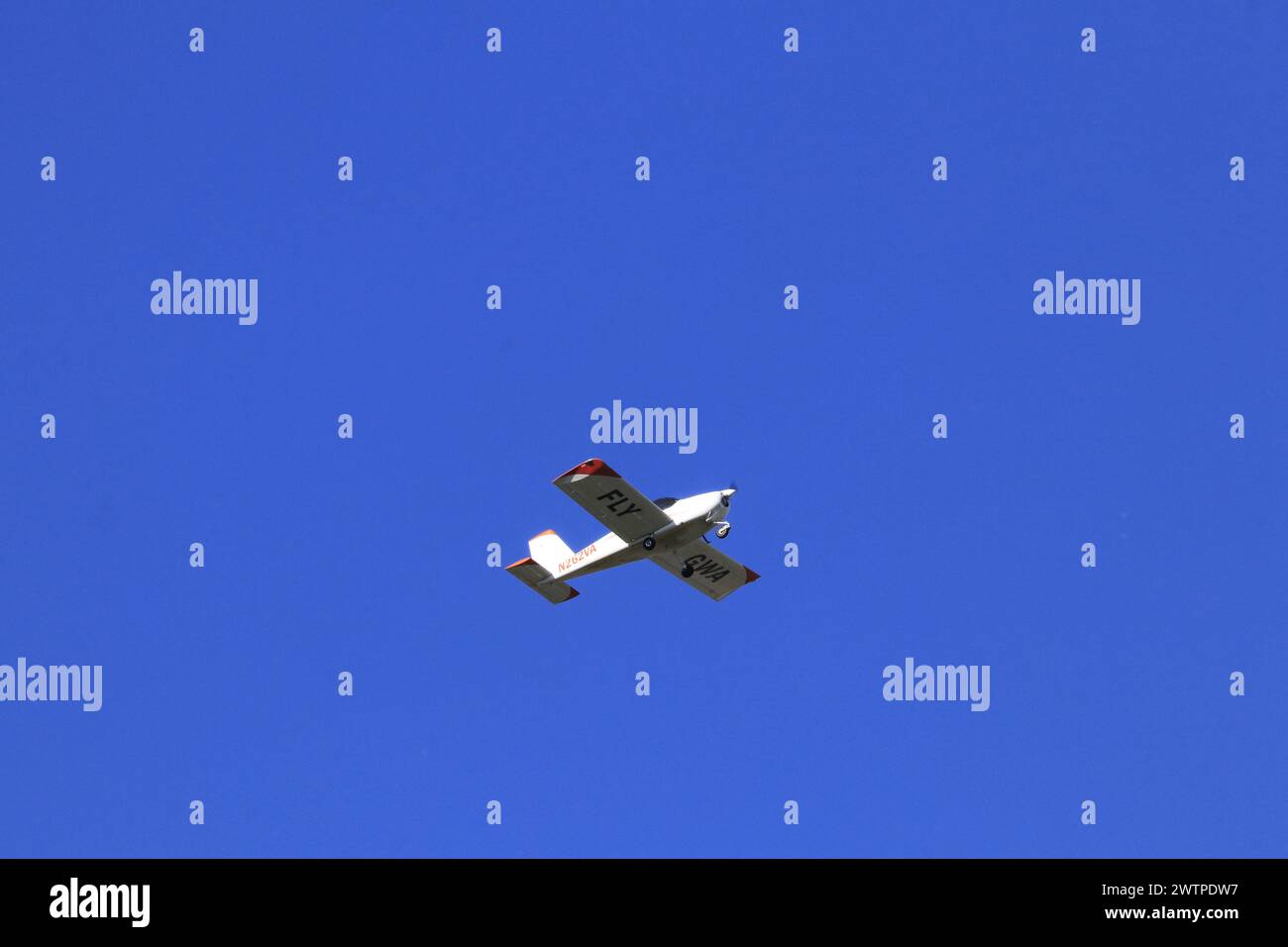 Plane flying over Utah with blue sky outdoor Stock Photo - Alamy