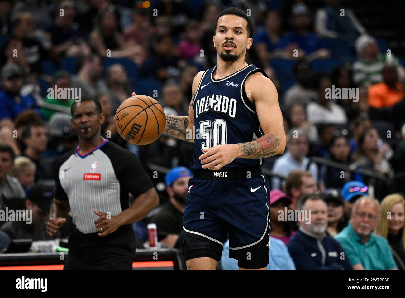 Orlando Magic guard Cole Anthony (50) brings the ball up the court ...