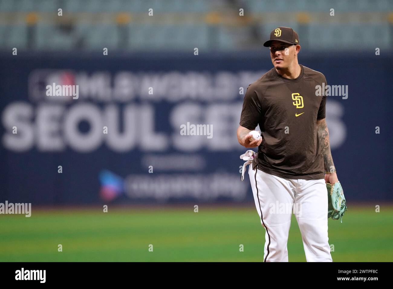 San Diego Padres Manny Machado fields a ground ball during a baseball ...