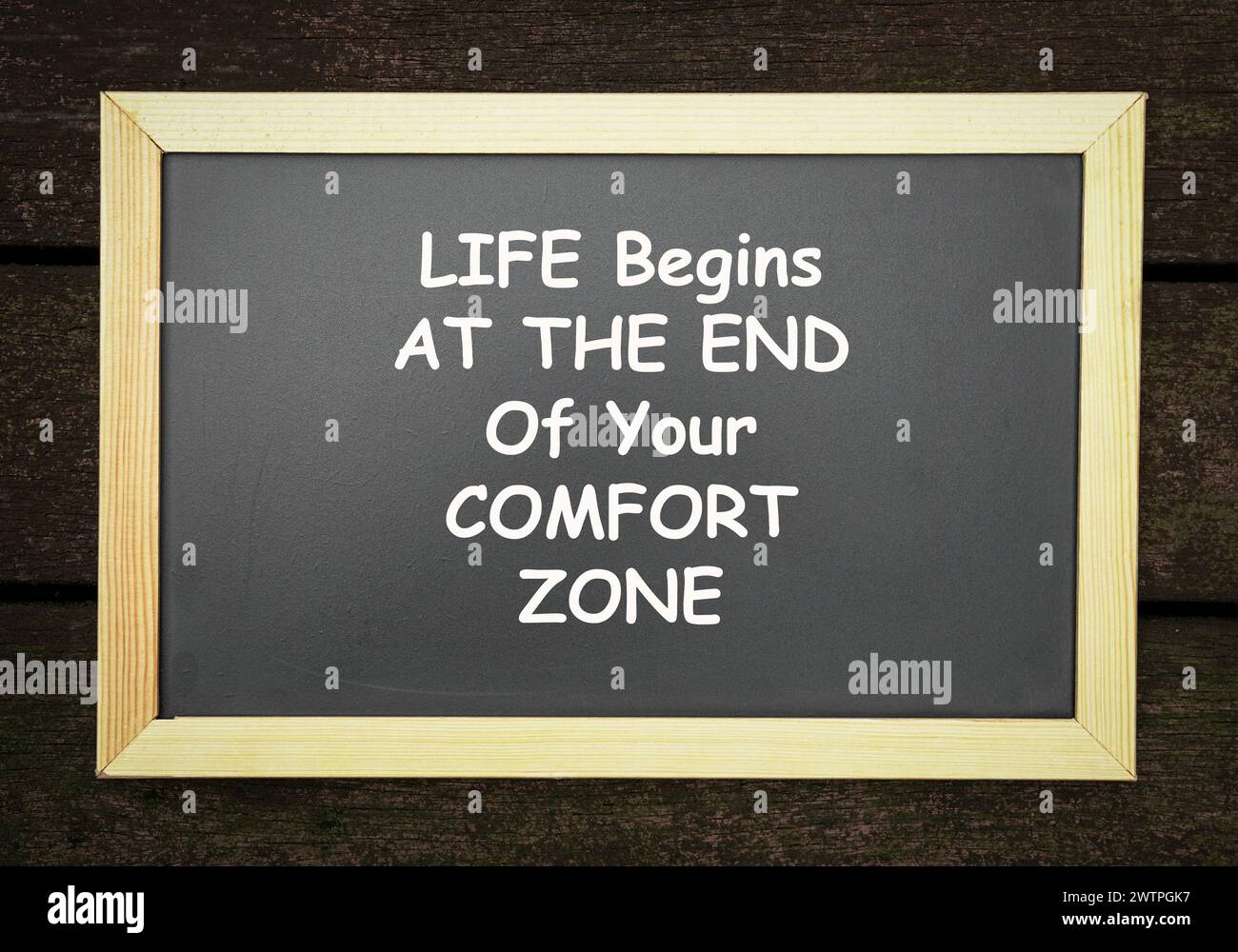 Life begins at the end of your comfort zone, words on blackboard Stock ...