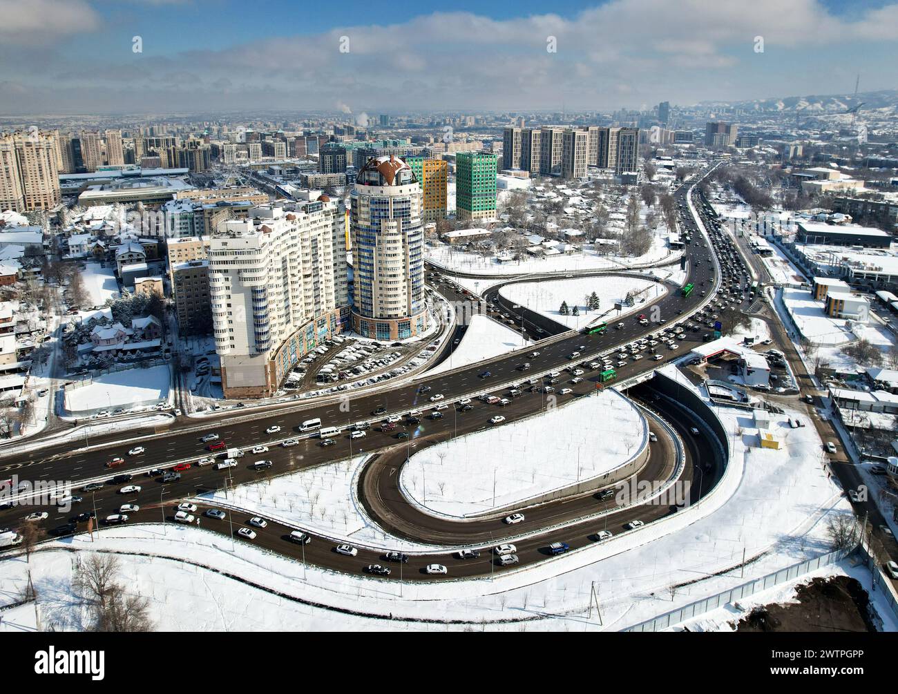 Aerial drone view panorama of Alfarabi avenue with car traffic and big ...