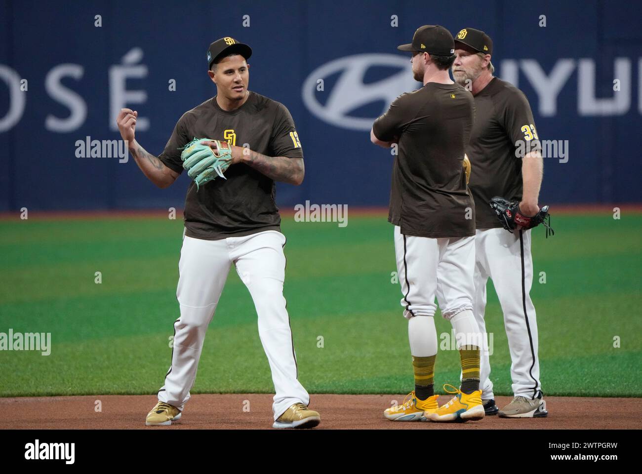 San Diego Padres' Manny Machado, left, attends a baseball workout at ...