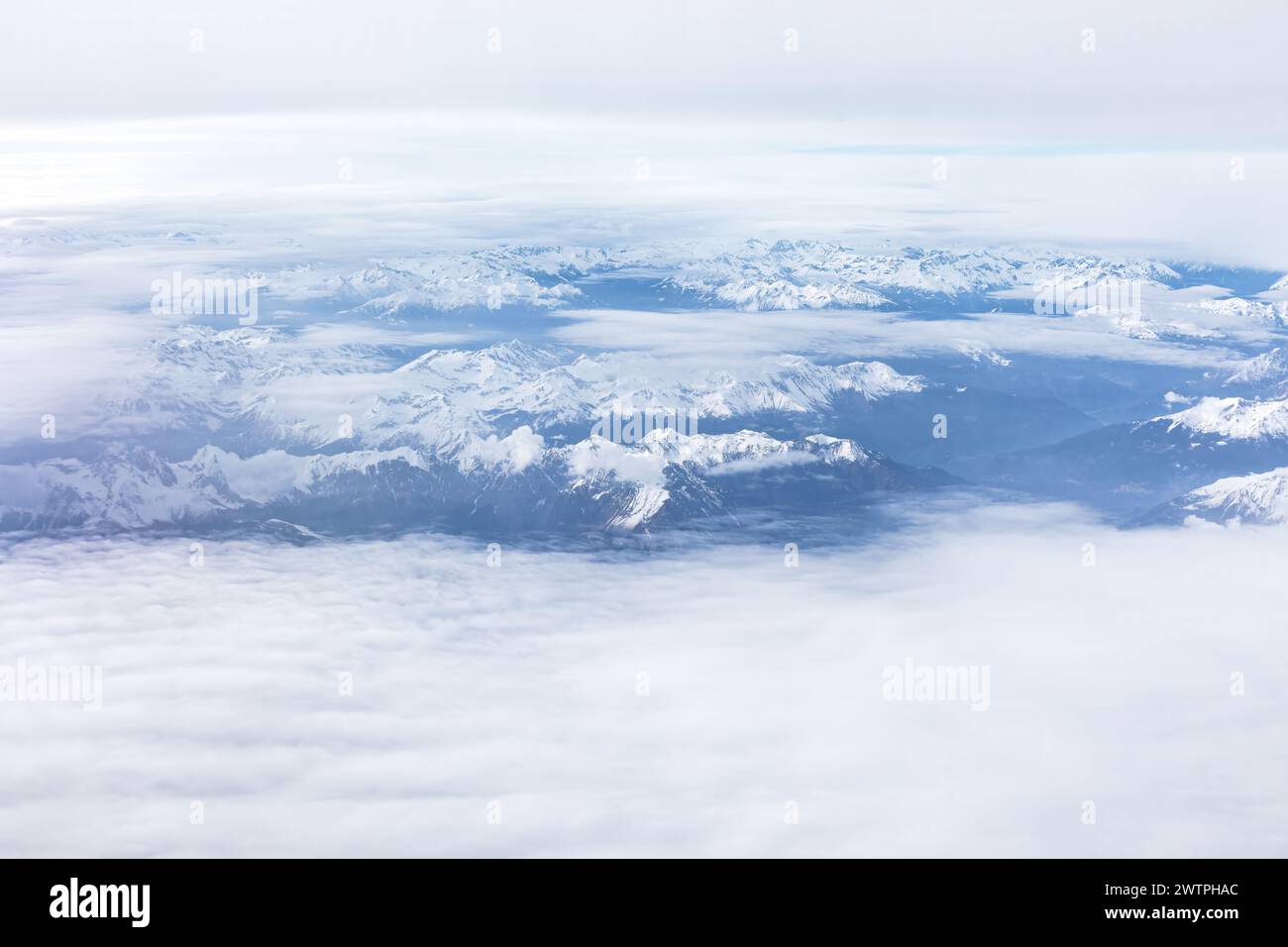 Aerial view flying through snowy hi-res stock photography and images ...