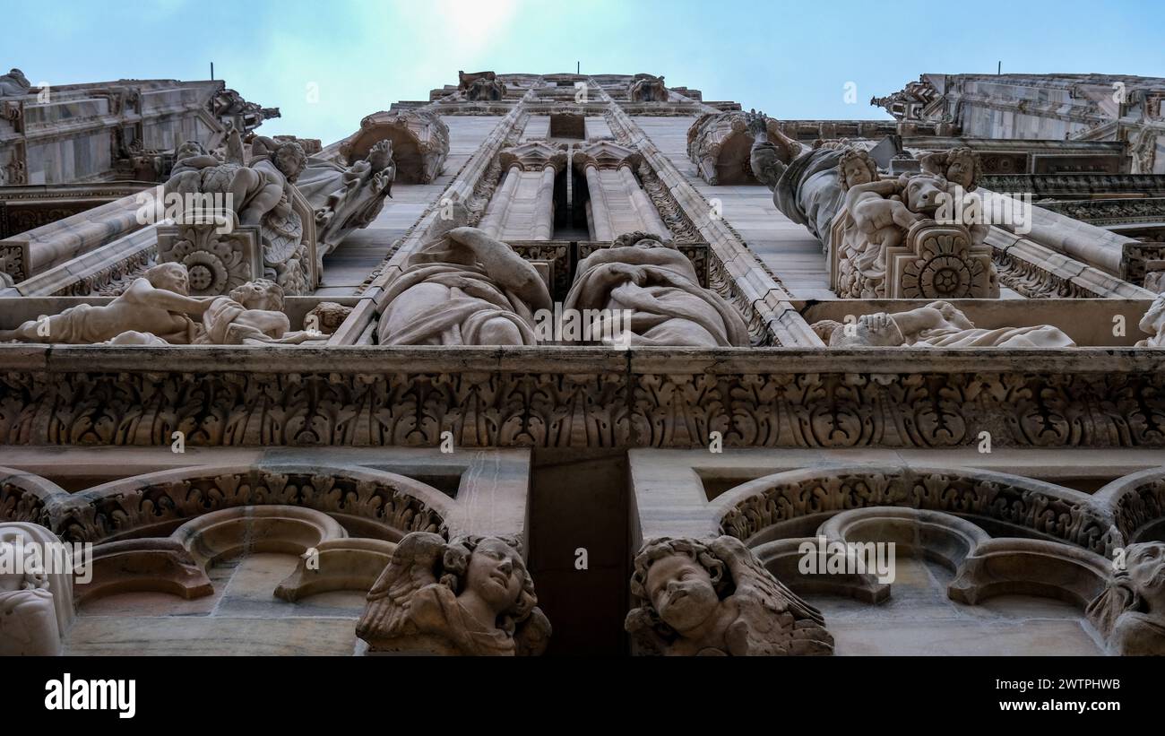 The iconic Milan Cathedral dome adorned with sculptures Stock Photo - Alamy