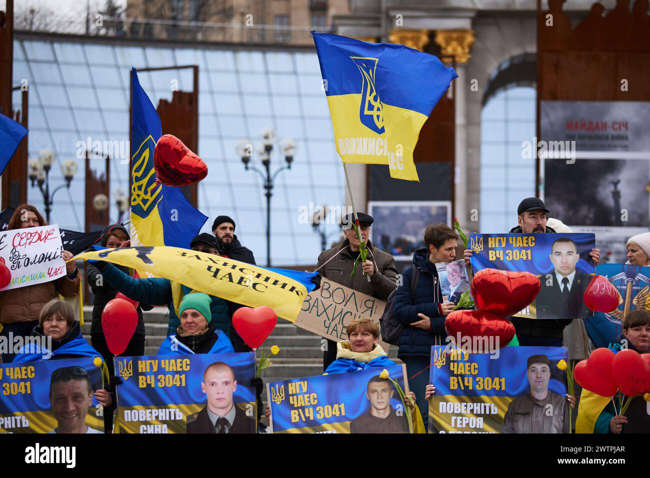 Ukrainian activists hold banners and flags on a peaceful demonstration ...