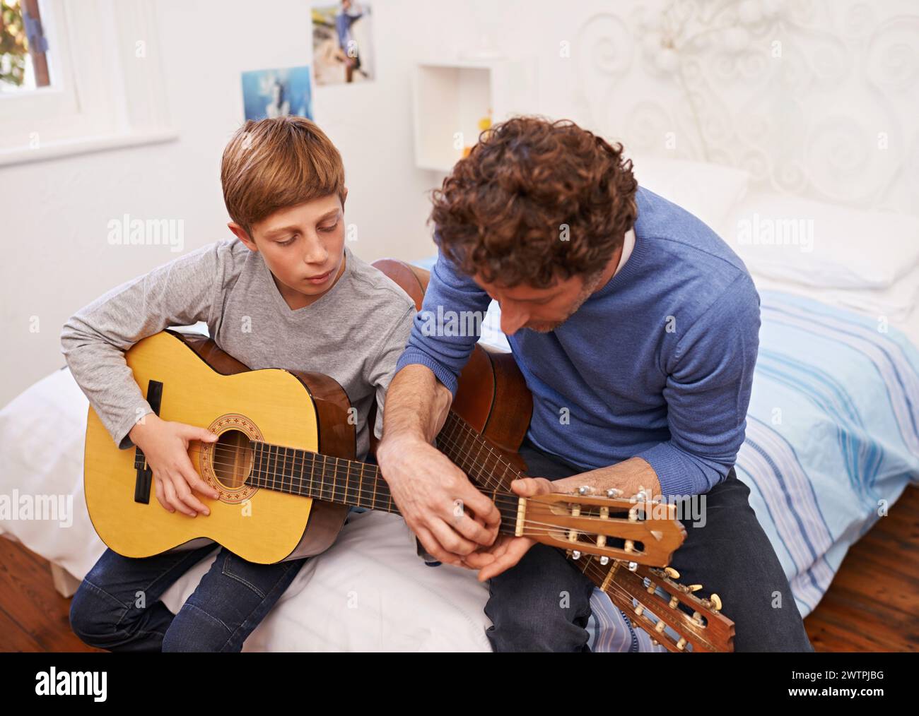 Guitar, teacher and learning music with child in lesson for development ...