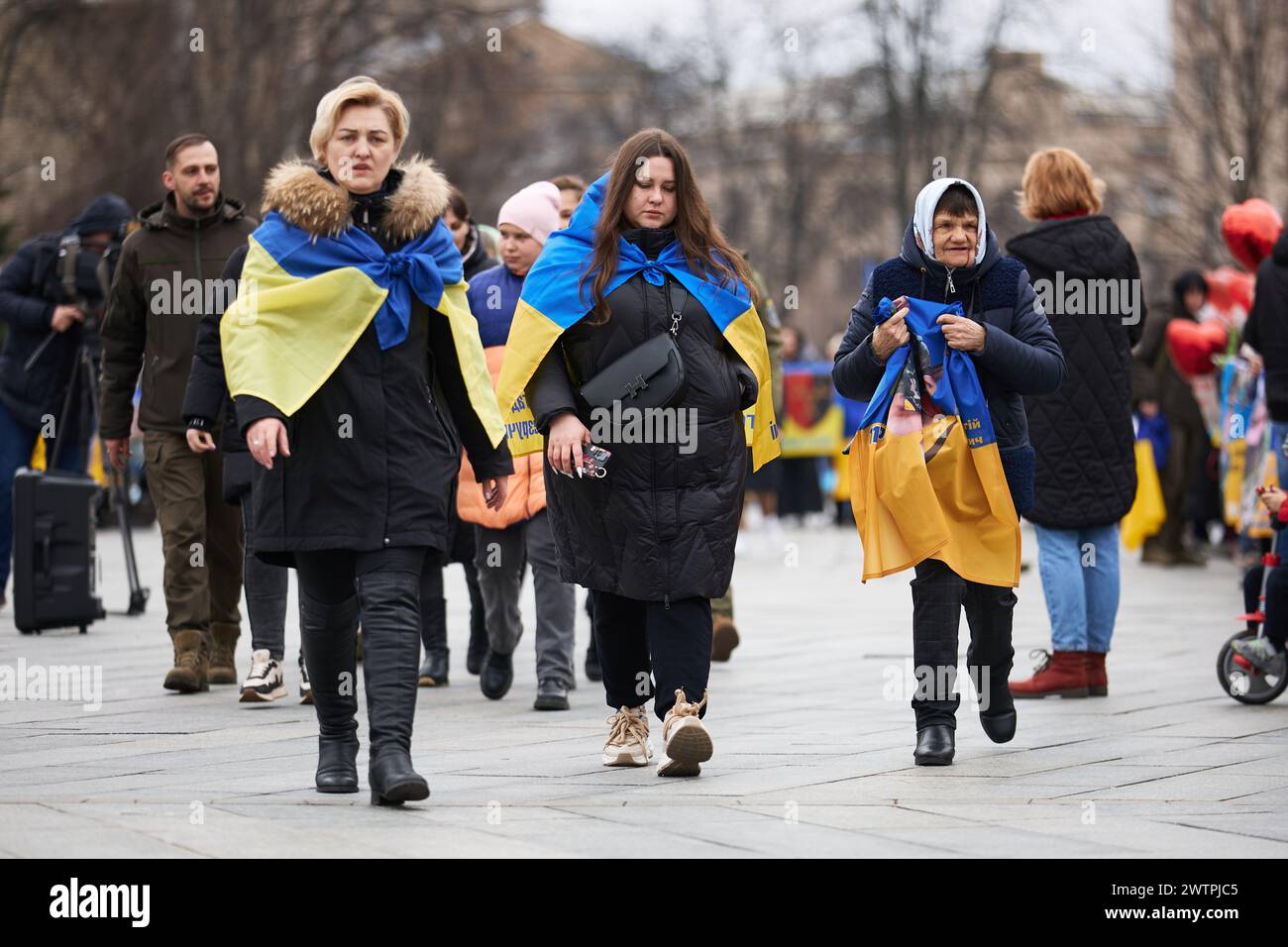 Ukrainian women walk with national flags on a peaceful demonstration at ...