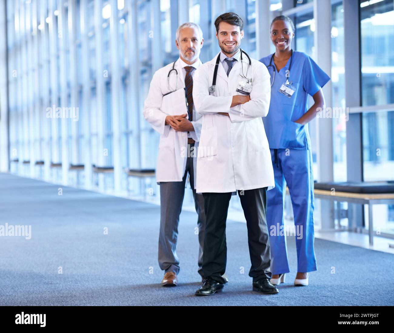 Diversity, medical team and smile in hospital in confidence or ...