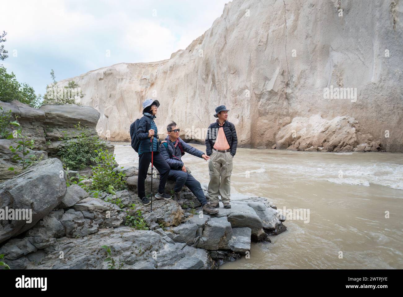 Three hikers enjoying the views of Valley of Ten Thousand Smokes ...
