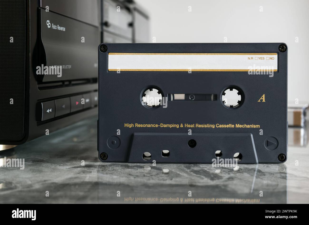 Front view of audio cassette with empty space for notes standing in ...