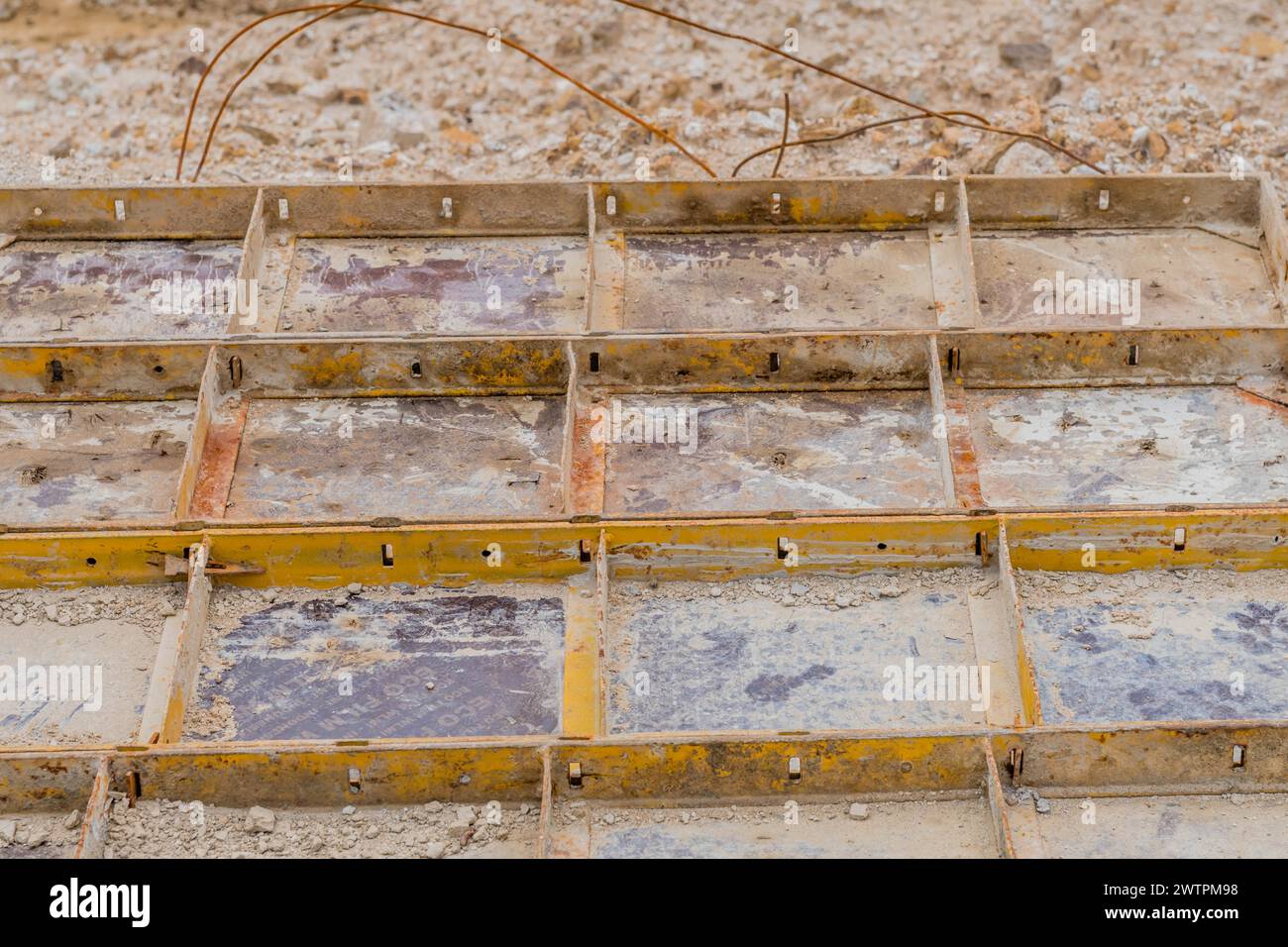 Rusty metal formwork for concrete laying at a construction site, in ...