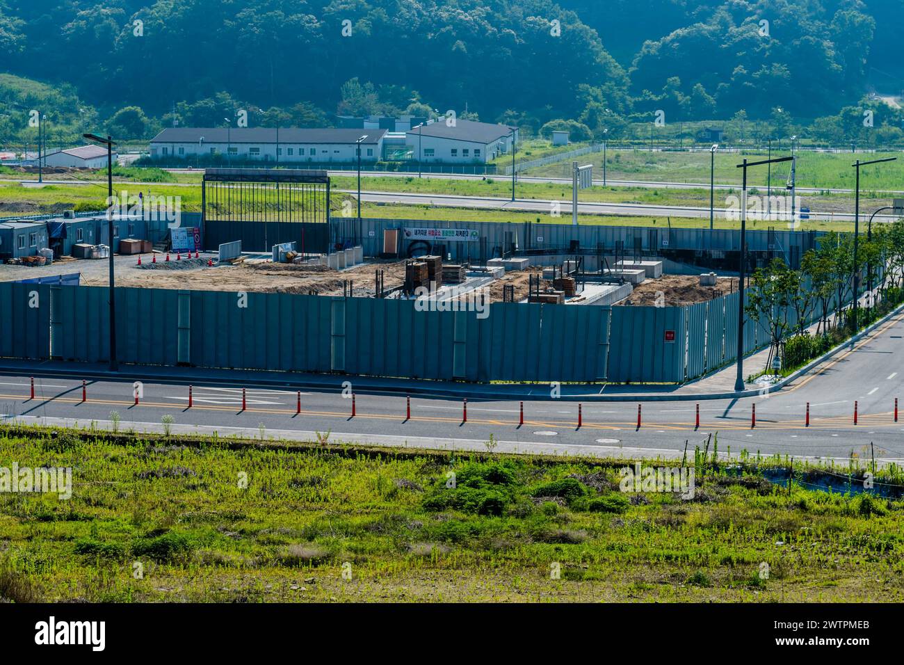 A construction site with new development in progress, surrounded by a ...