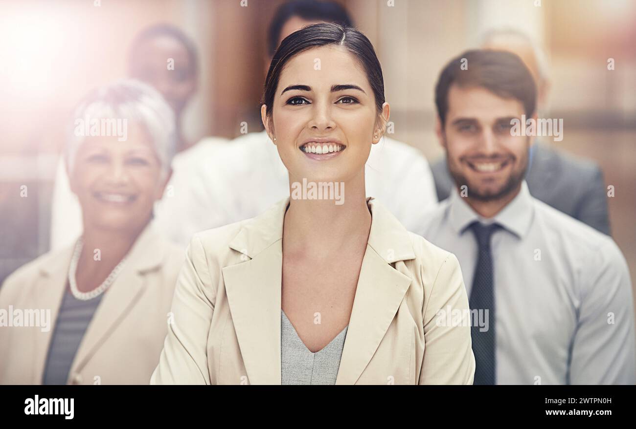 Portrait, leadership and business woman with group in office for ...