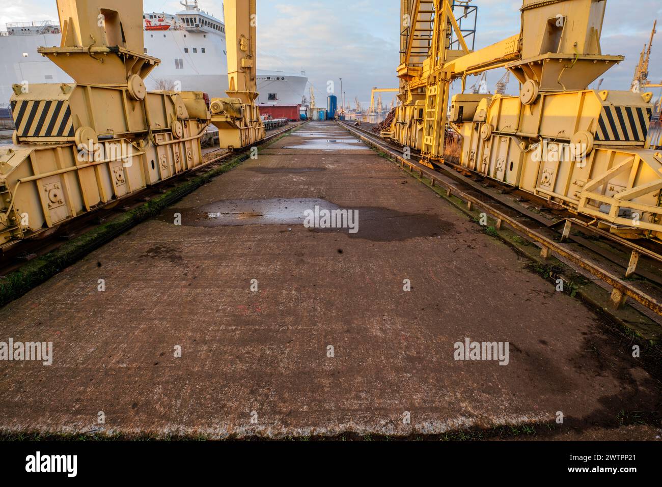 the quay of the ship repair yard including cranes Stock Photo - Alamy