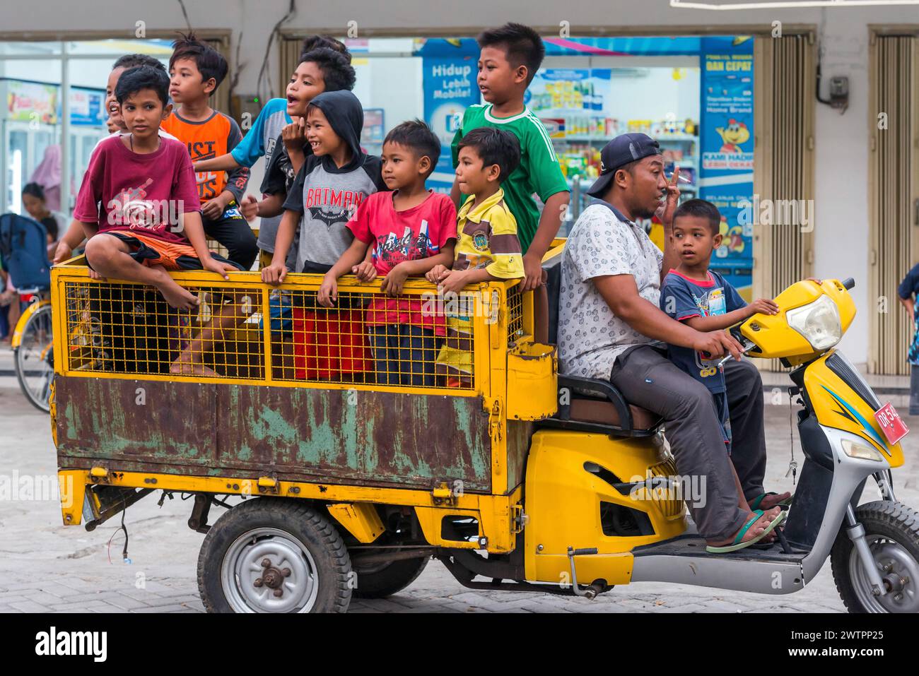 Children on a vehicle in an Indonesian village, village, child, boy ...