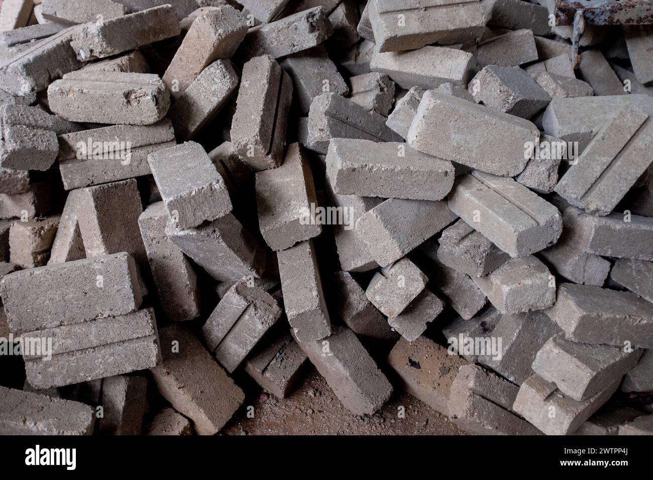 sun dried clay or mud bricks scattered at a work site in Malaysia Stock ...