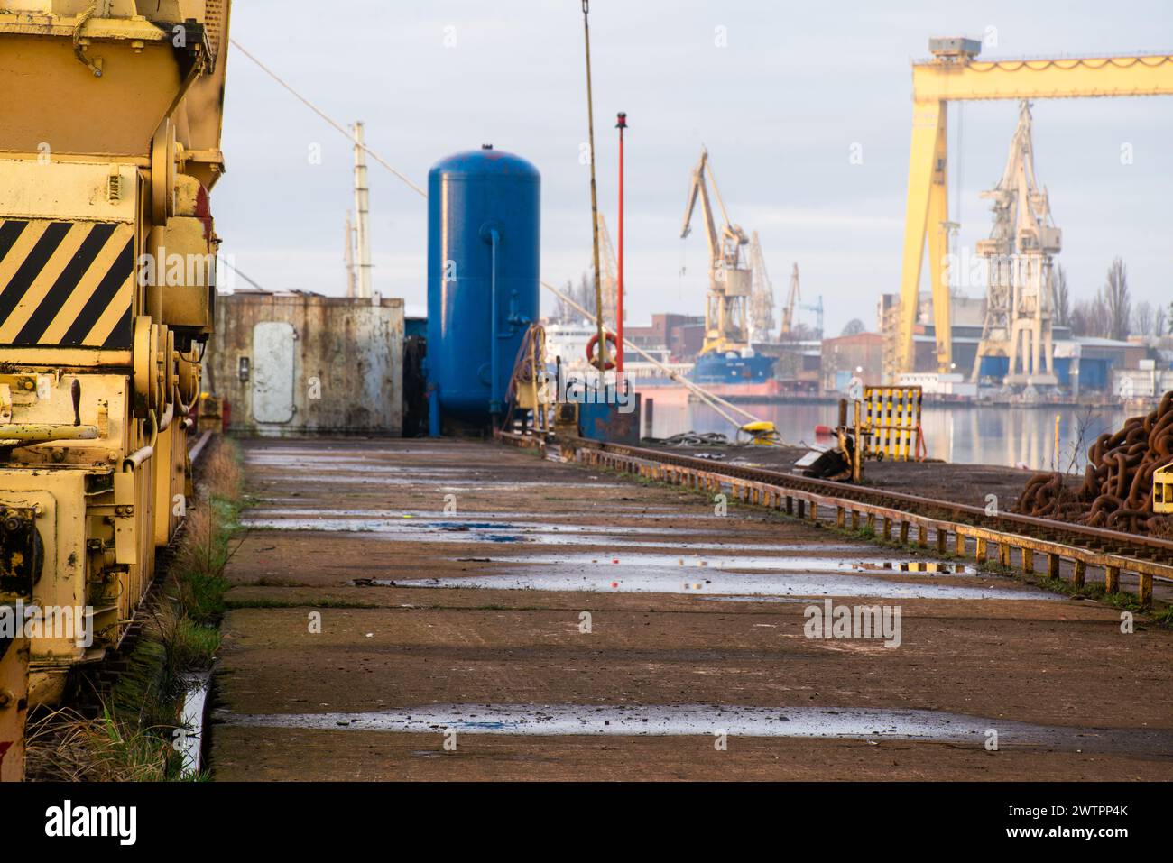 the quay of the ship repair yard including cranes Stock Photo - Alamy
