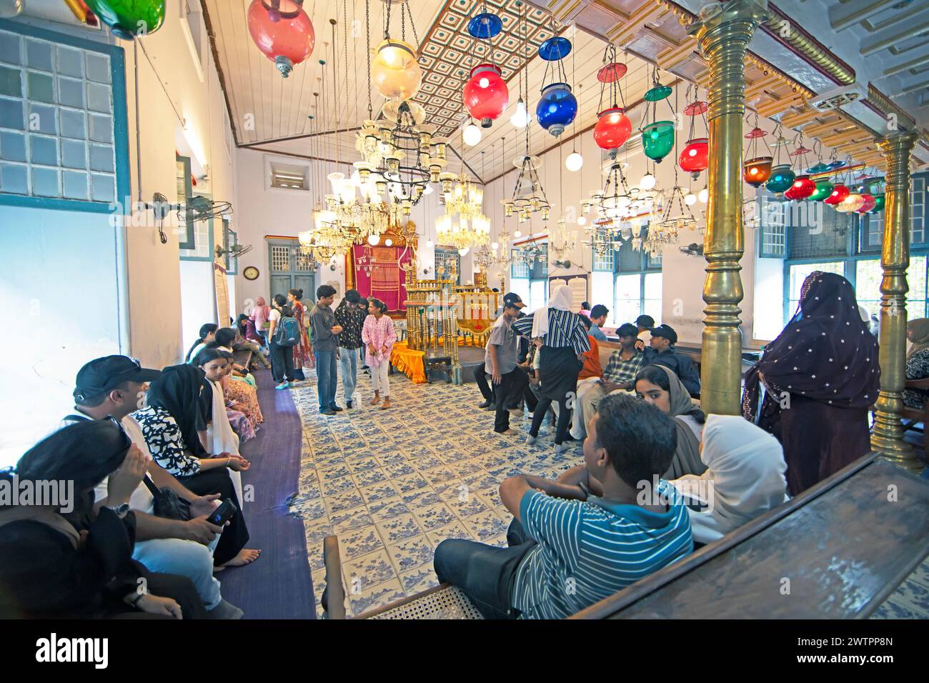 Indian visitors in the interior of the Paradesi Synagogue, Matancherry ...