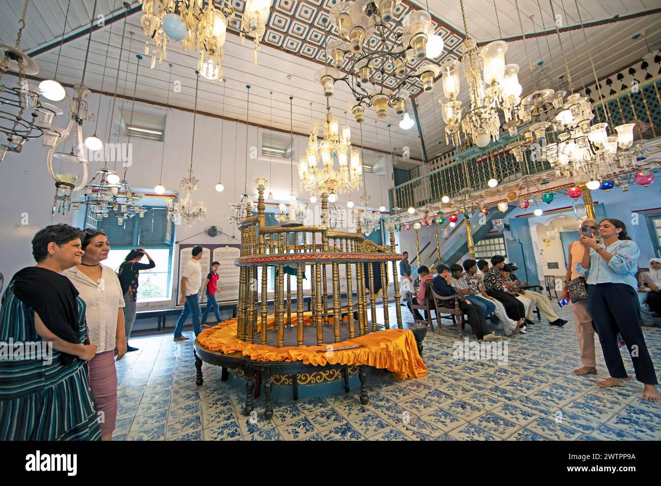 Indian visitors in the interior of the Paradesi Synagogue, Matancherry ...