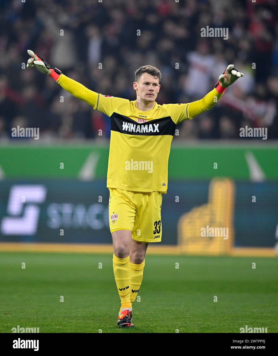 Goalkeeper Alexander Nuebel VfB Stuttgart (33) cheers, PreZero Arena ...