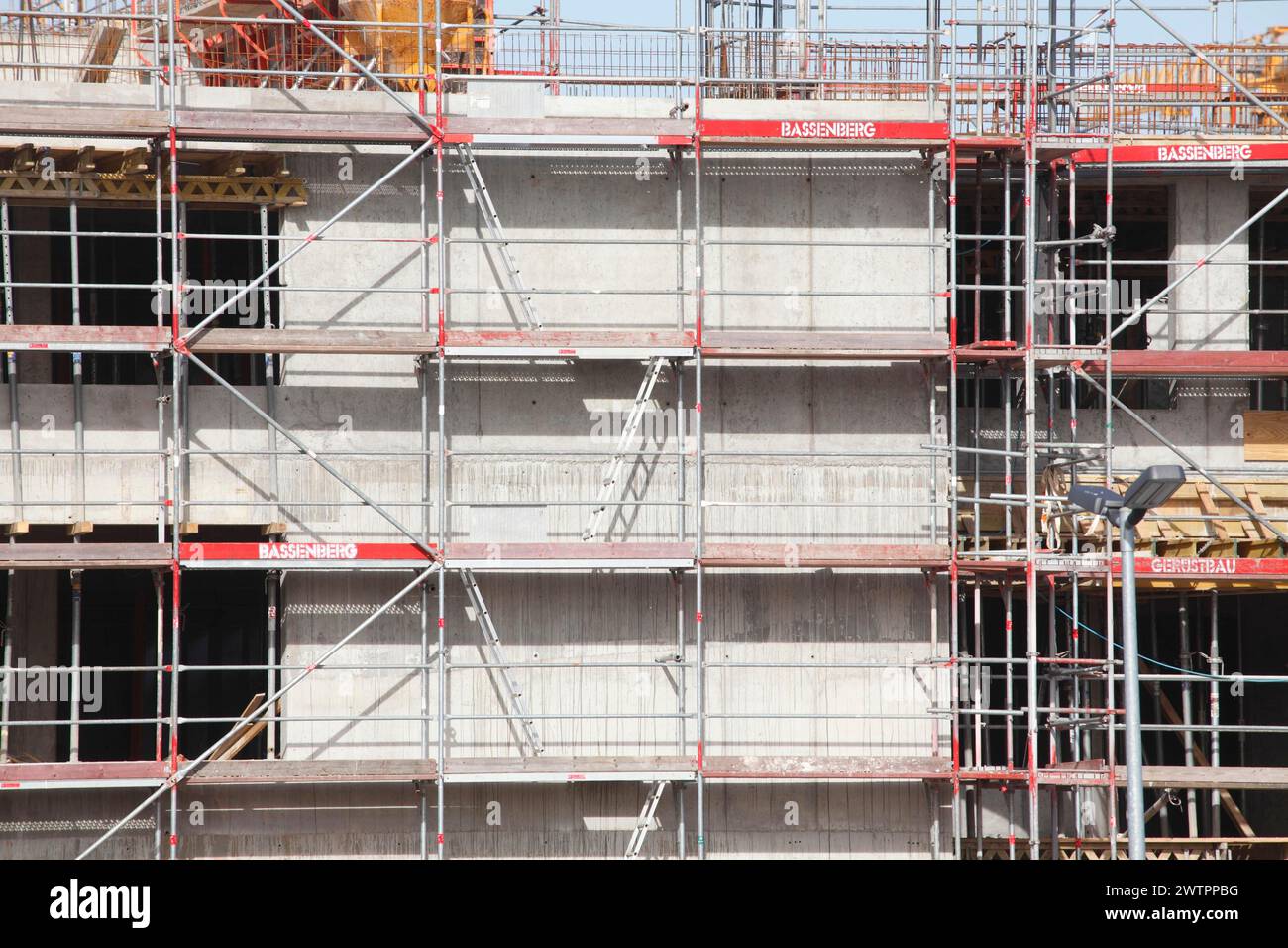 Shell of a residential and commercial building, house wall with windows ...