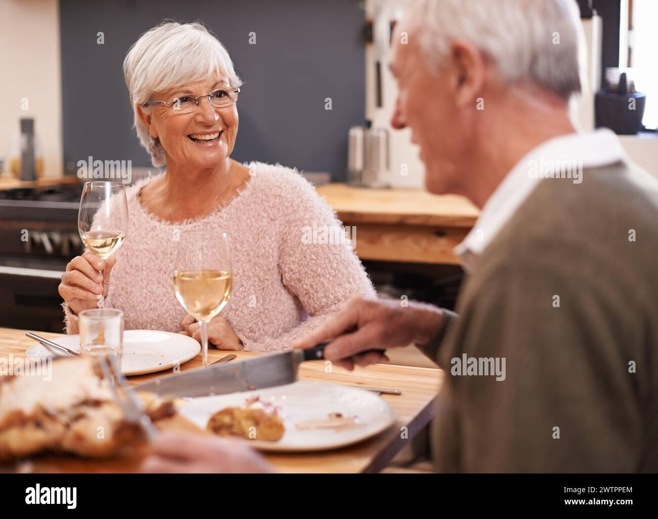 Elderly couple, food and alcohol for love at table, conversation and ...