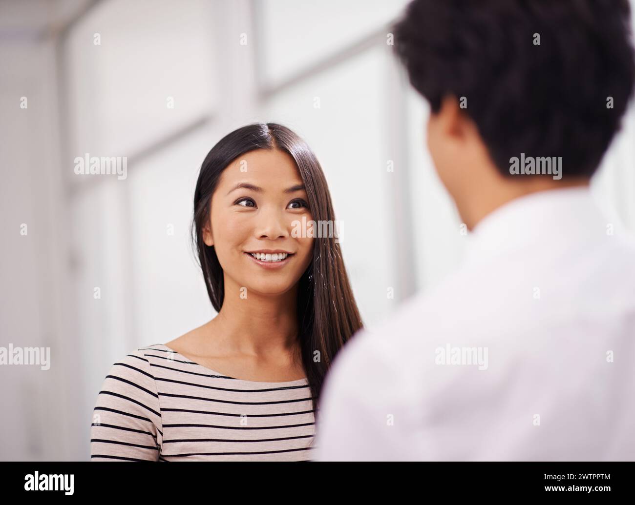 Business, cooperation and happy woman in conversation at office with ...